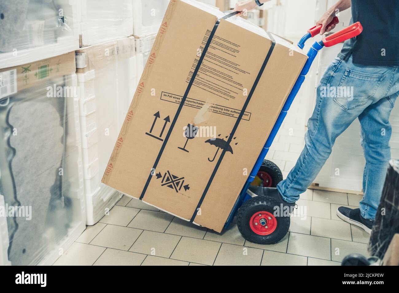 Loading in refrigerator hi-res stock photography and images - Alamy