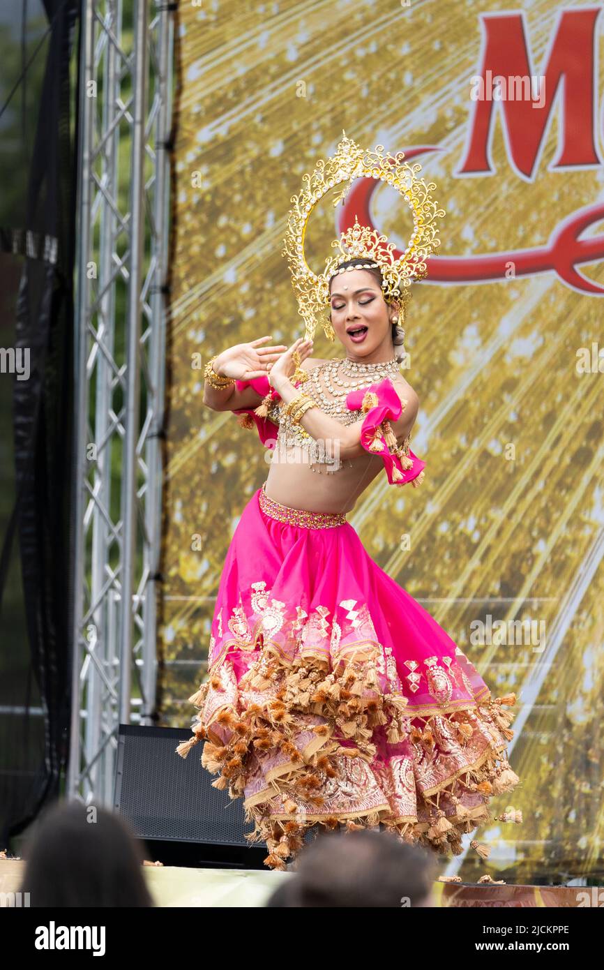 A Thai female singer and performer on stage at the Magic of Thailand ...