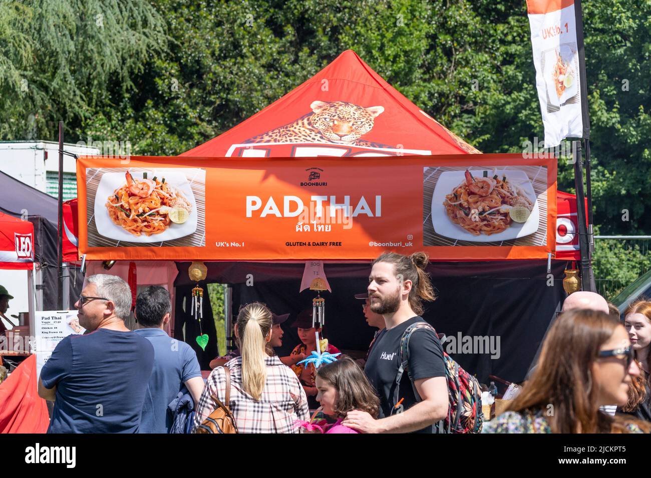 People buying food at a Pad Thai stall at the Magic of Thailand ...