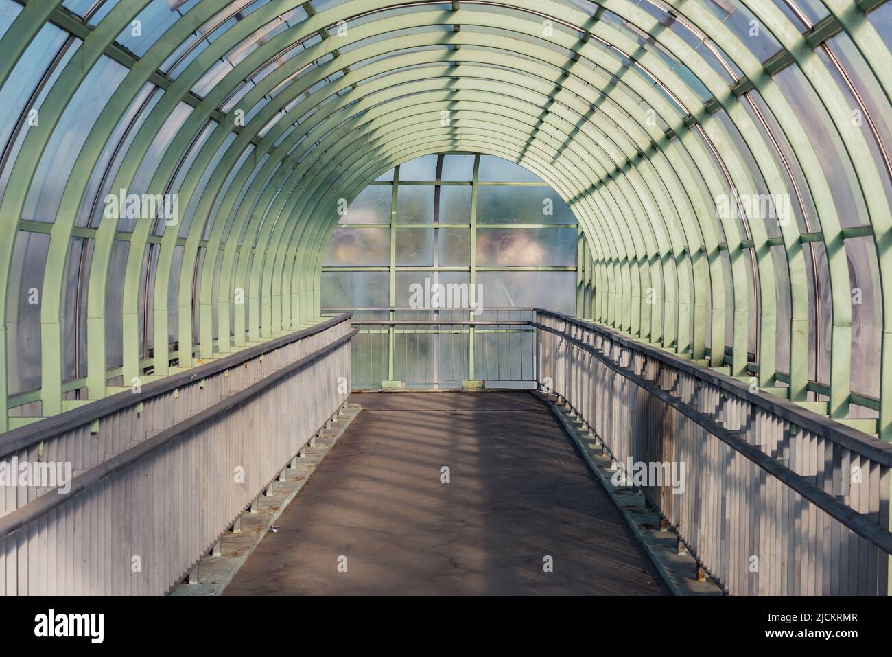 Metal and glass corridor above the highway Stock Photo - Alamy