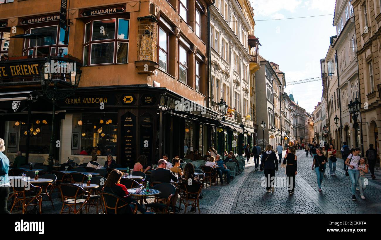 Street photo at a Cafe in Prague Stock Photo - Alamy