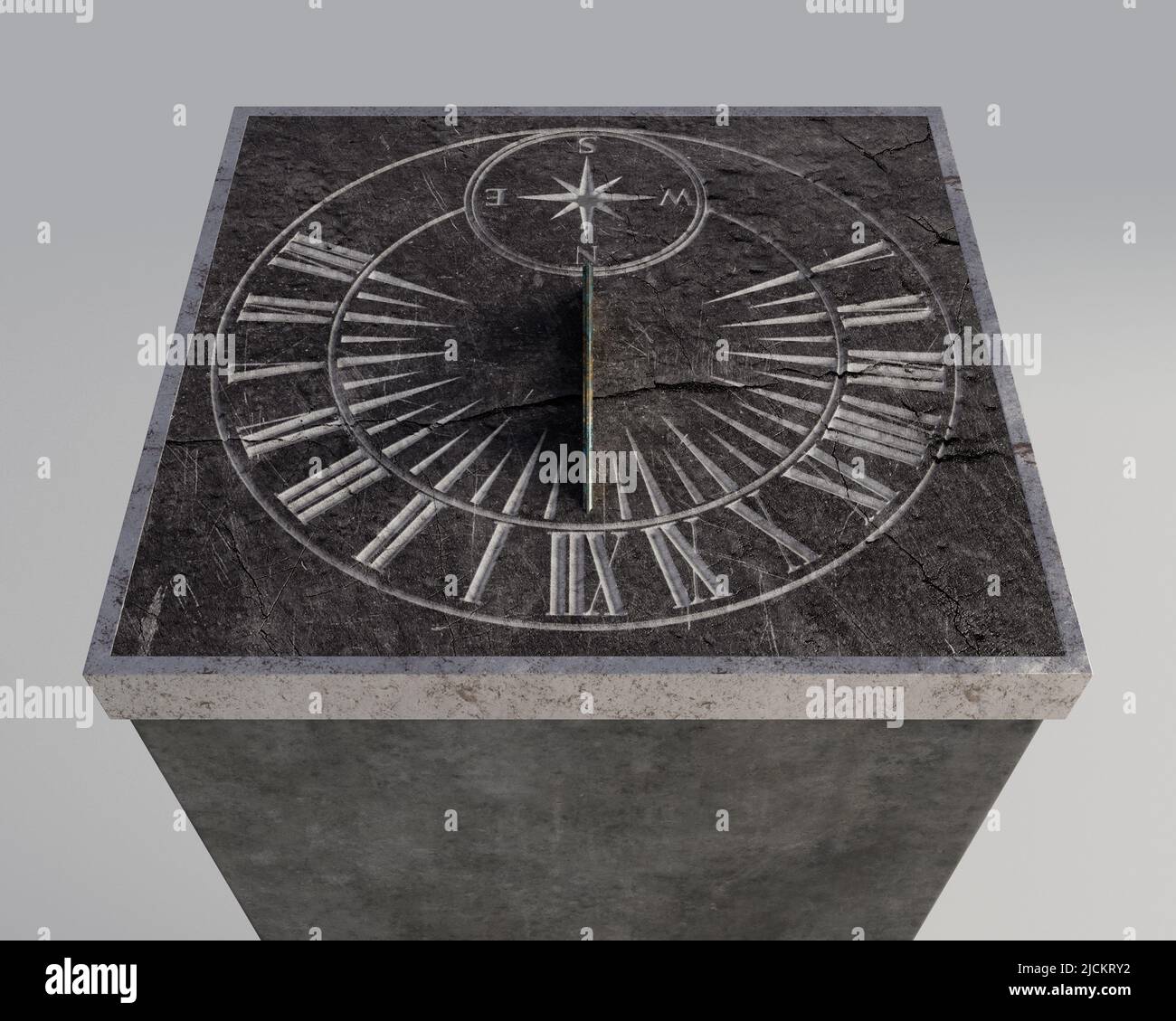 A square stone sundial with etched roman numerals standing an a ...
