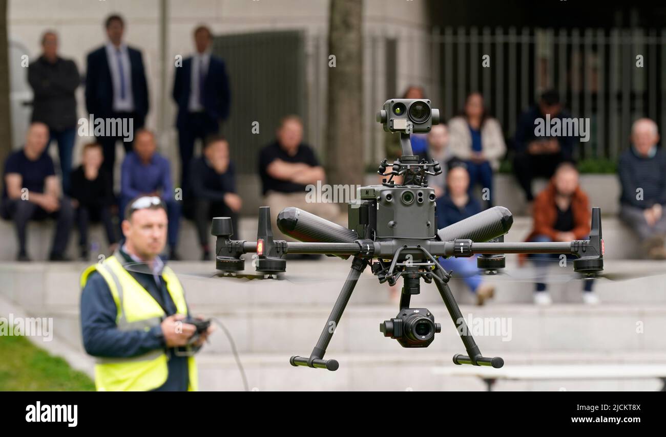 Drone pilot Fergal McCarthy from the company Geoaerospace demonstrates ...