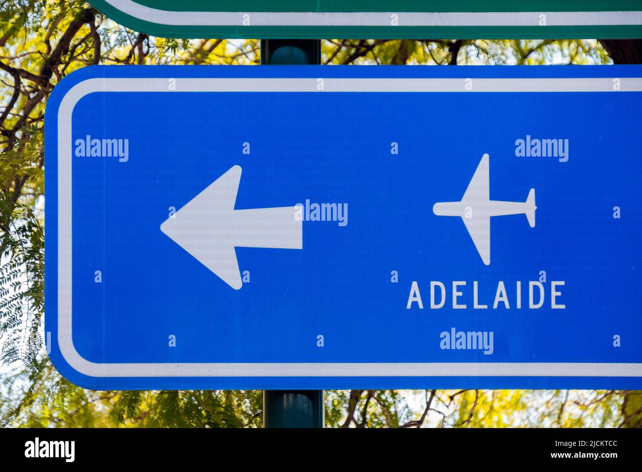 Road sign showing direction to the Airport in Adelaide, South Australia ...