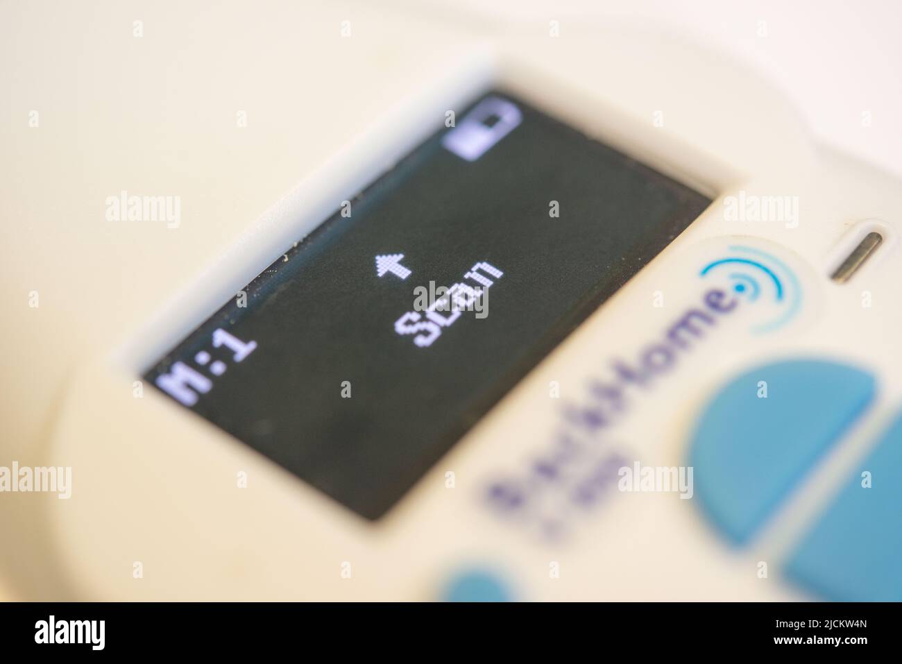 Dog microchip scanner in scanning mode Stock Photo - Alamy