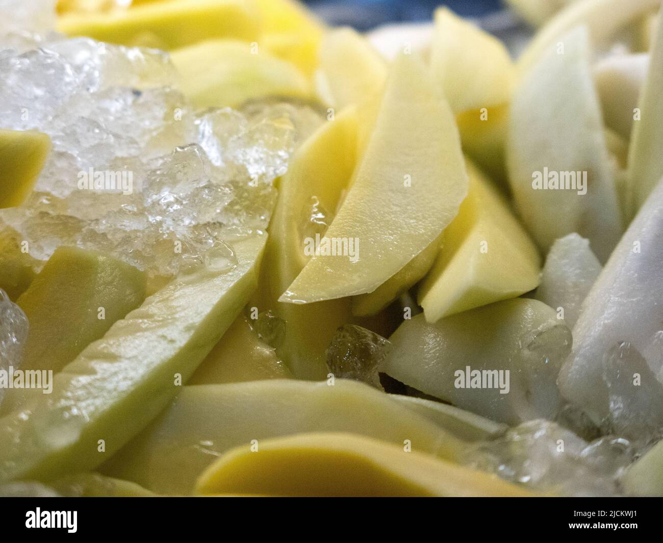 Sliced Guava with ice cube presentation for lunch or tea Stock Photo ...