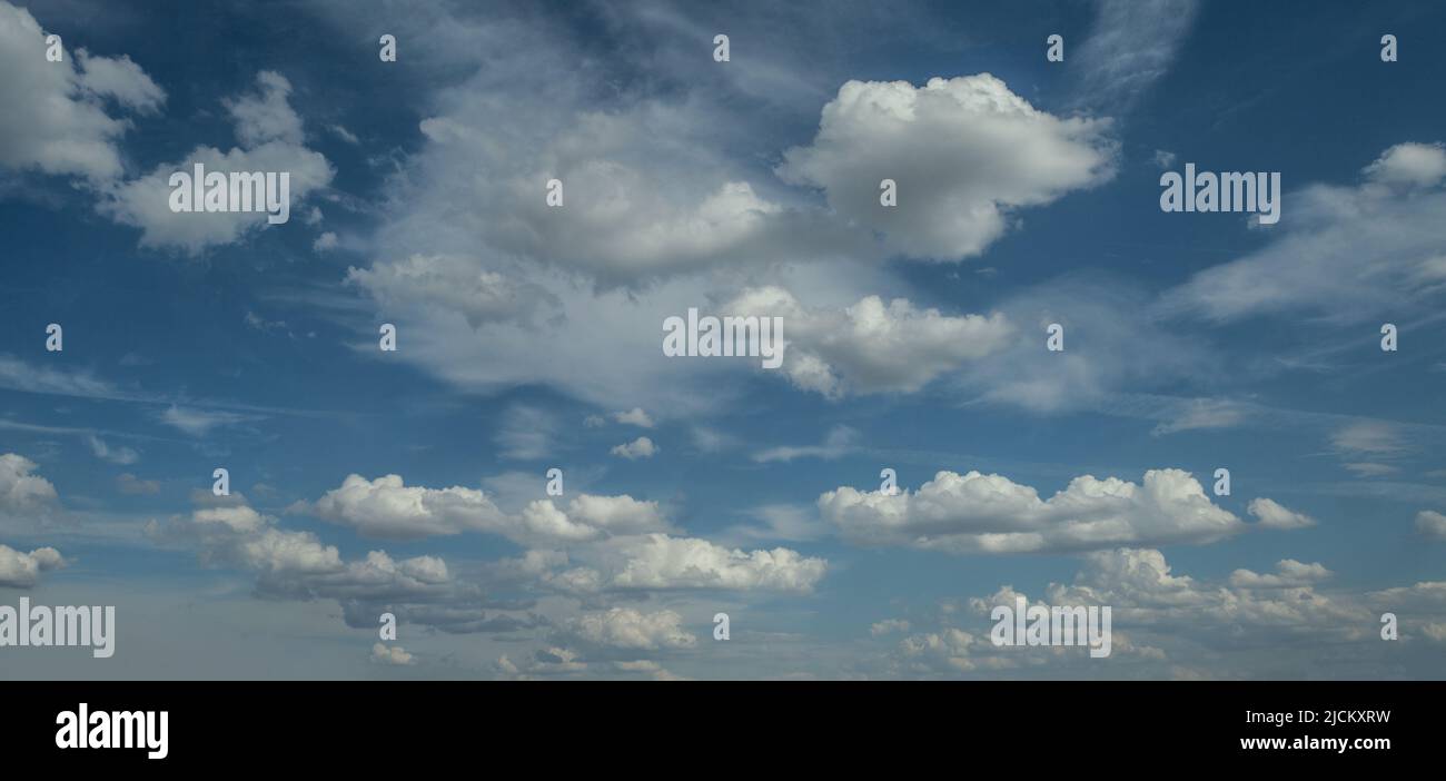 White cumulus clouds formation in blue sky panoramic background Stock ...