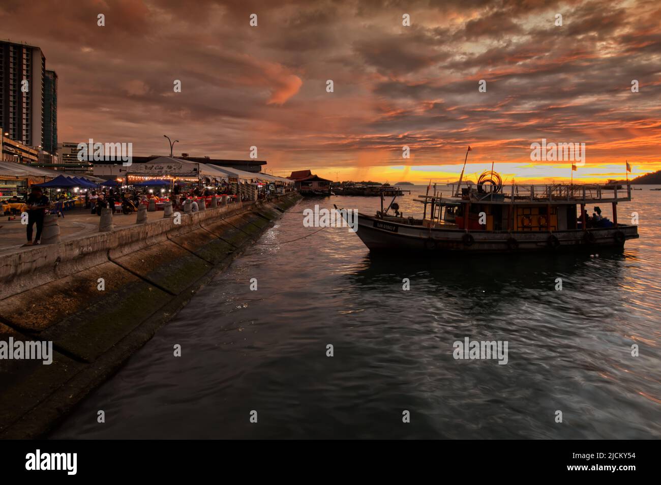 Kota Kinabalu waterfront during sunset Stock Photo - Alamy