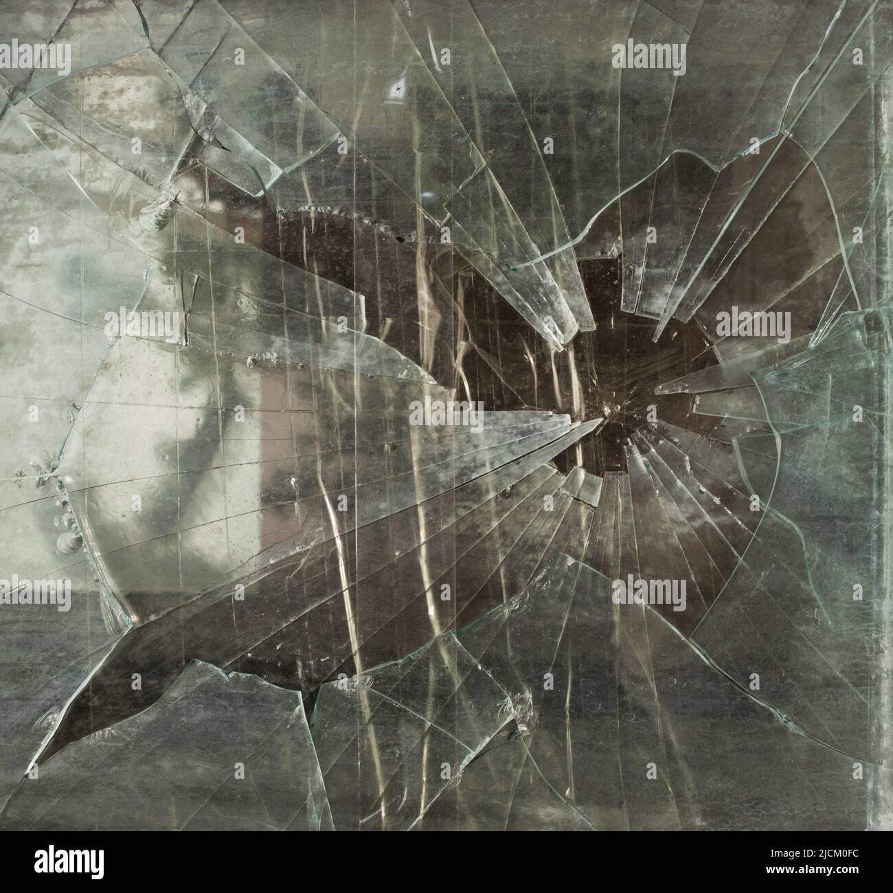 Cracked window glass background texture Stock Photo - Alamy