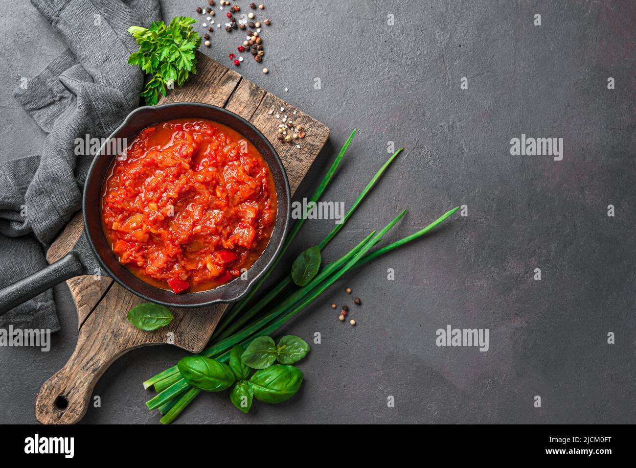 Classic tomato sauce on a dark background Stock Photo - Alamy