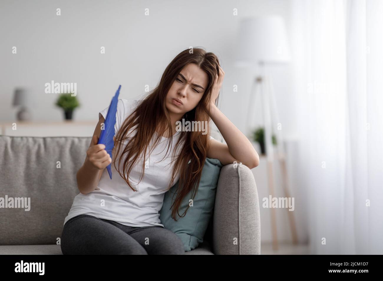 Sad young female fan hi-res stock photography and images - Alamy