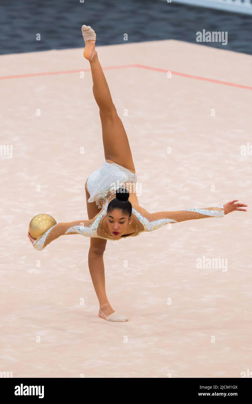 New Zealand Senior International Rhythmic Gymnast Laylah Waggie Performing A Penche Pivot In new-zealand-senior-international-rhythmic-gymnast-laylah-waggie-performing-a-penche-pivot-in