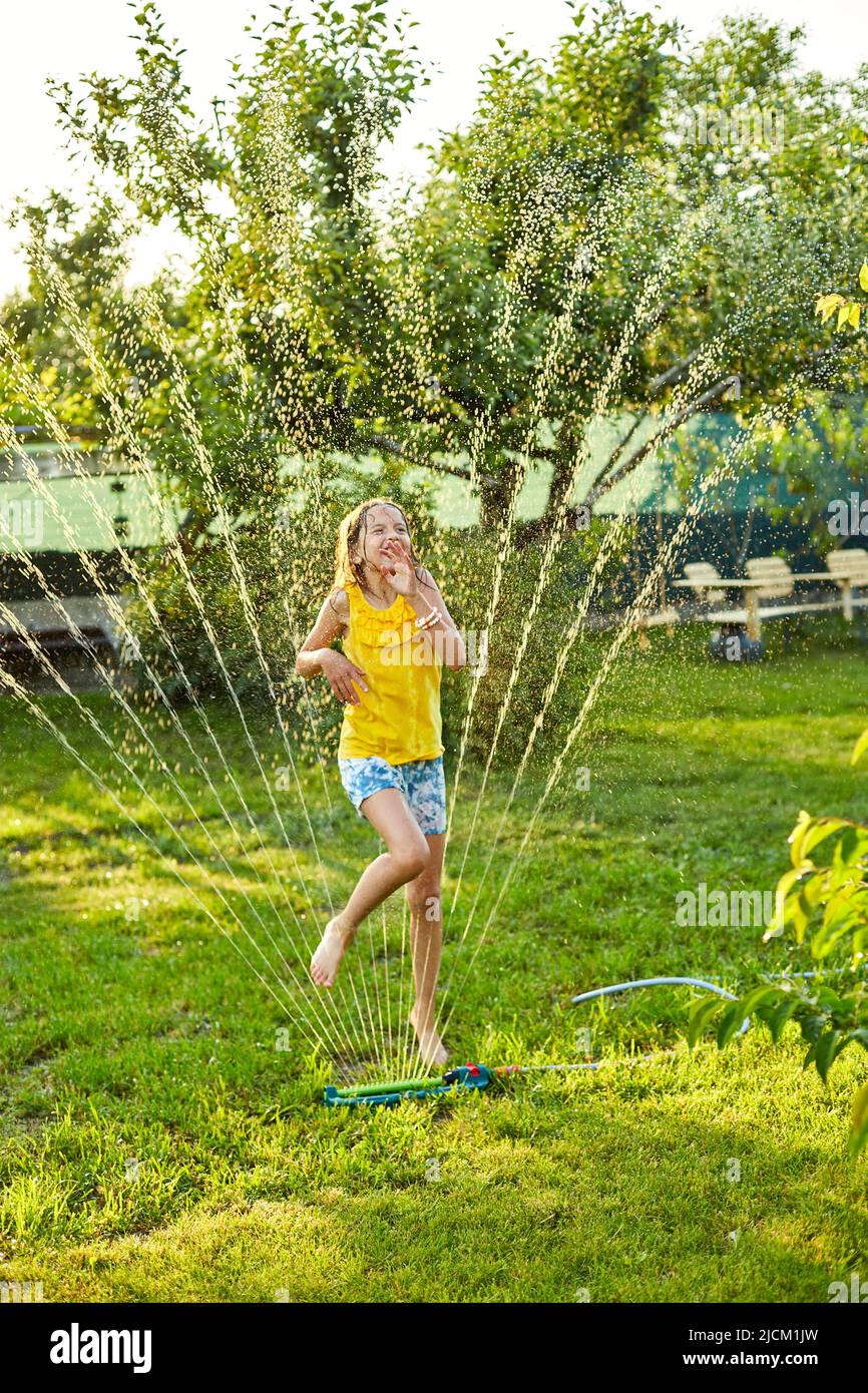 Outdoor summer day garden child wet hi-res stock photography and images ...