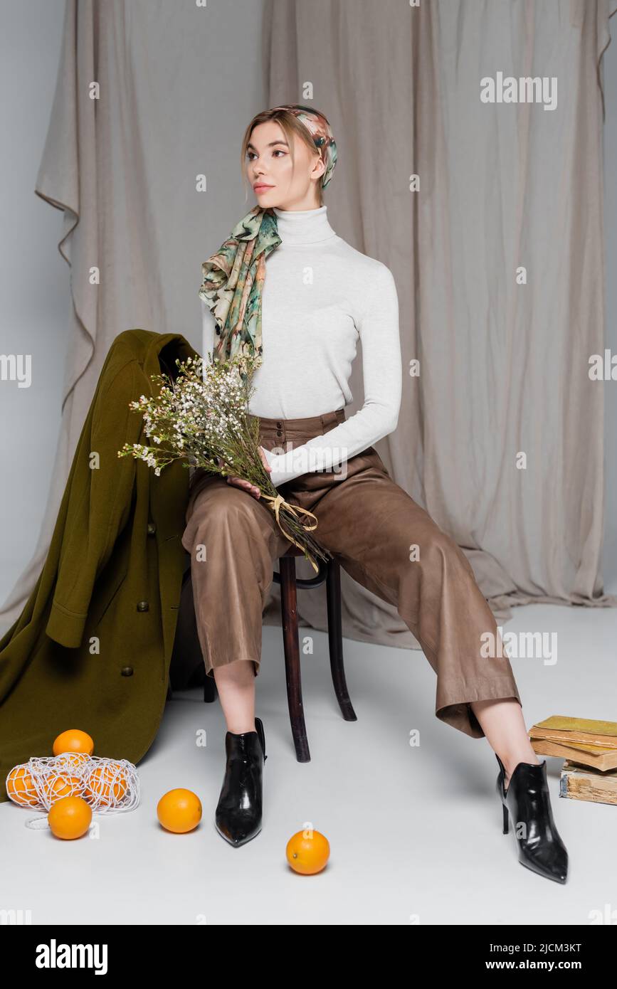 Clothes draped on chair hi-res stock photography and images - Alamy