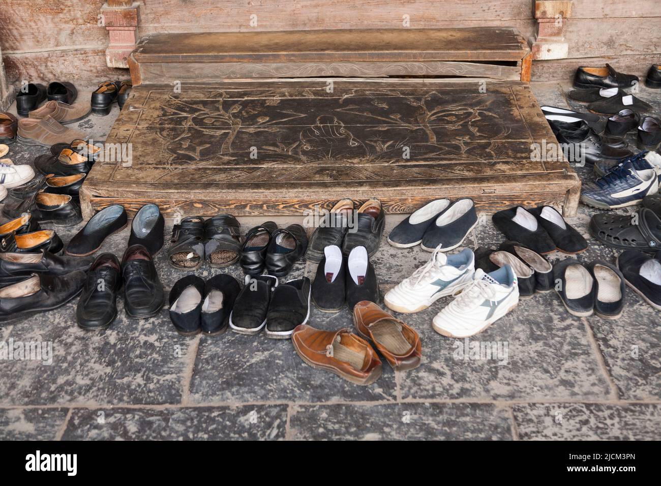 Shoes of worshippers left outside the preaching hall prayer room ...