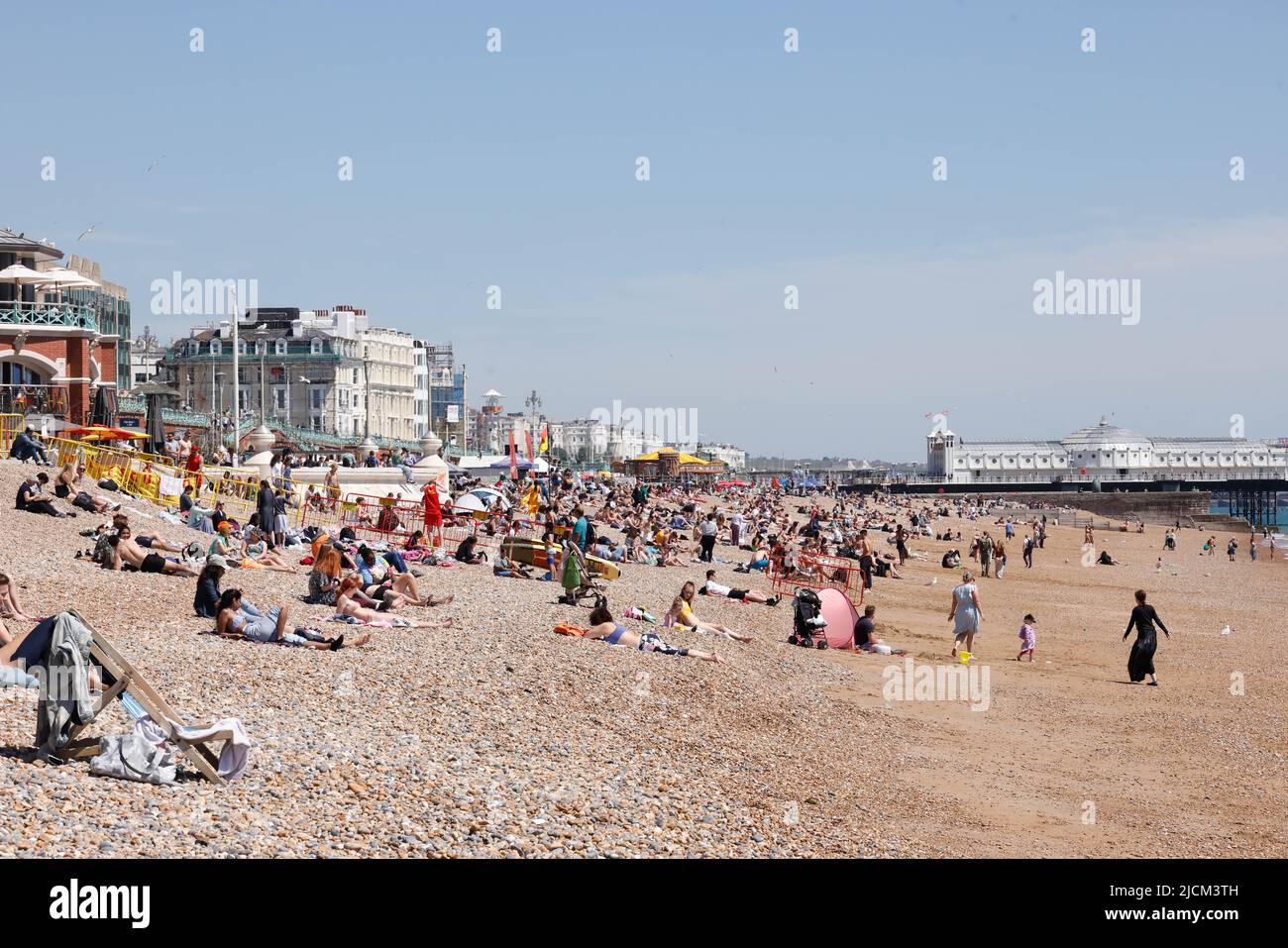 Brighton, UK, 14th June 2022, Brighton Beach getting busy for summer ...