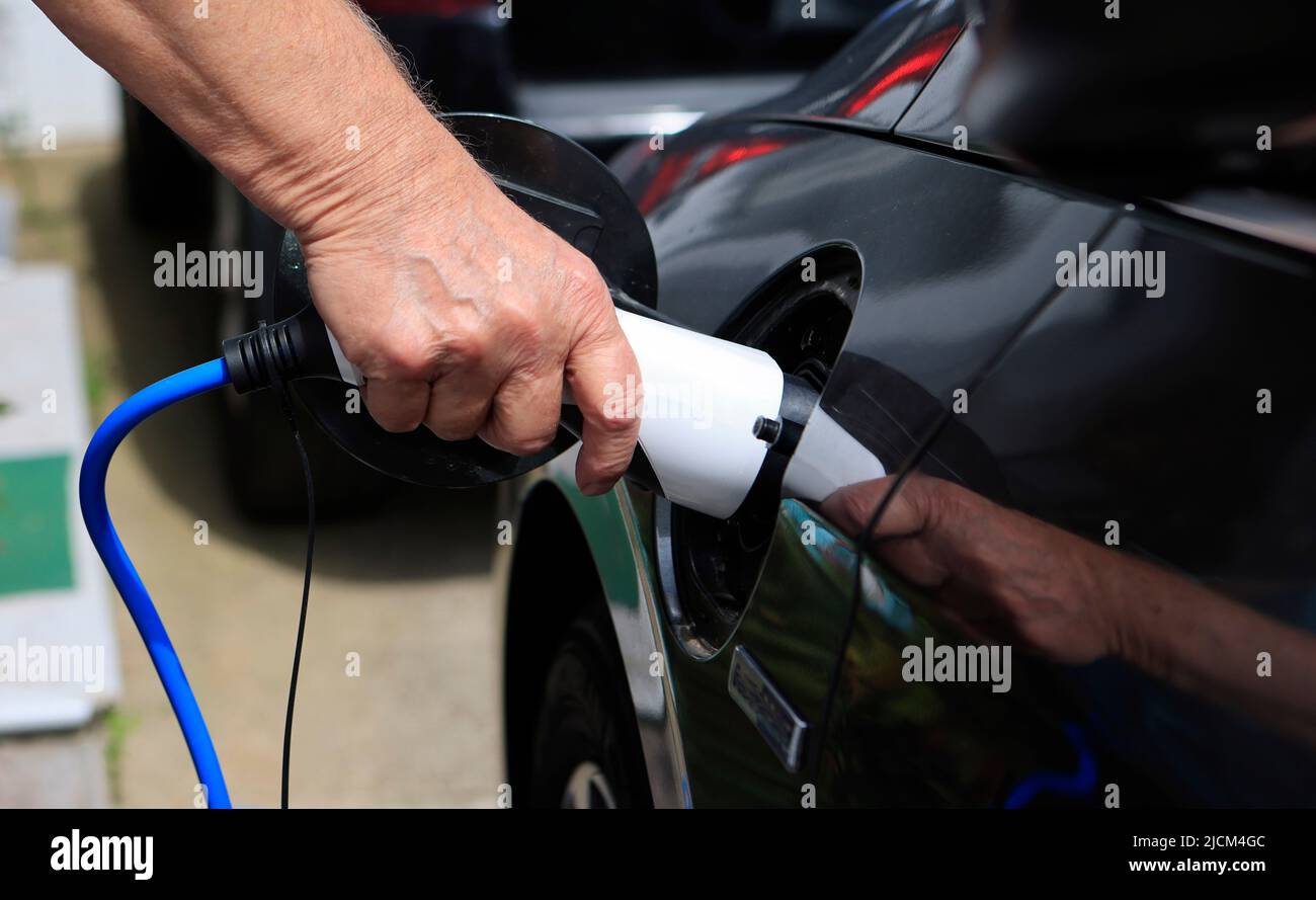 E-Mobility, Charging an electric car Stock Photo - Alamy