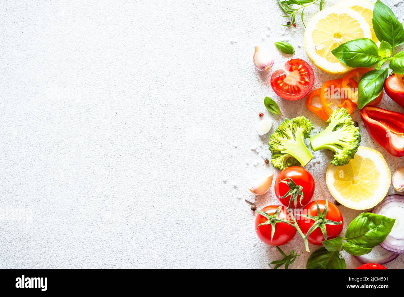 Food cooking background on white table Stock Photo - Alamy