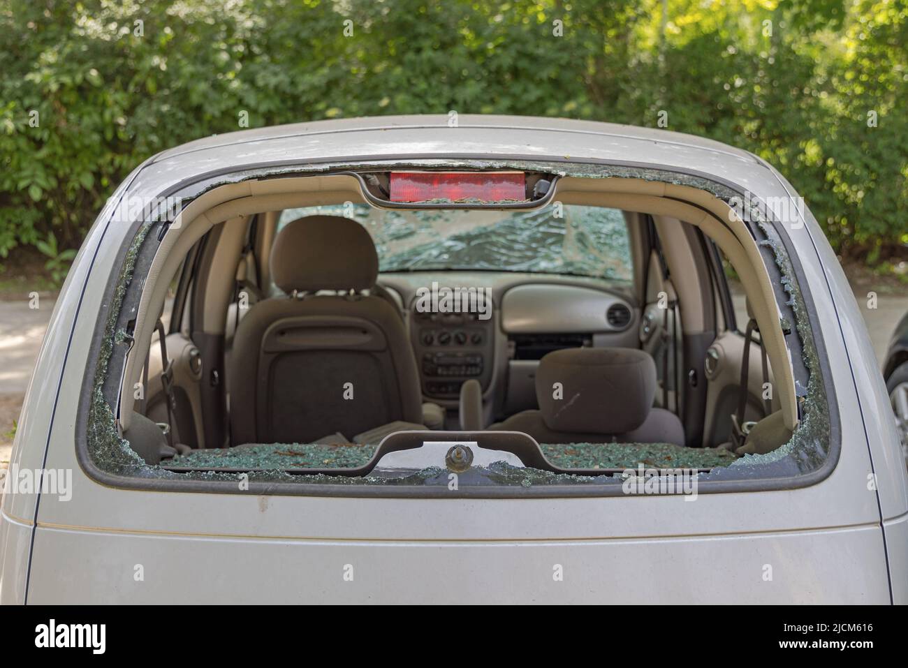 Broken Rear Car Window Shuttered Glass Pieces Damage Stock Photo - Alamy