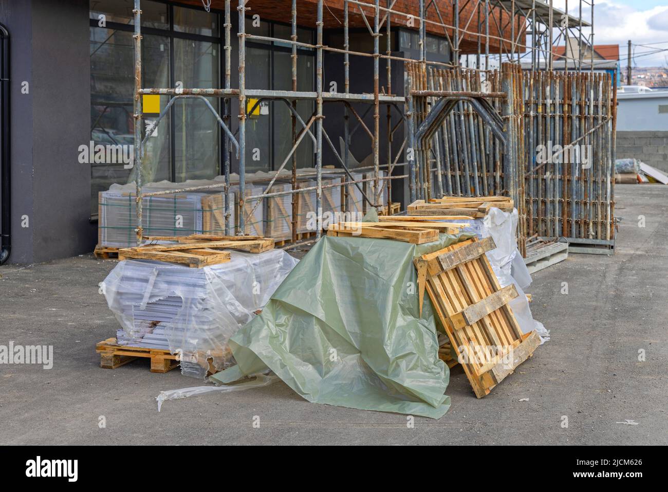Material in Boxes Pallets at Construction Site Scaffolding Preparation ...