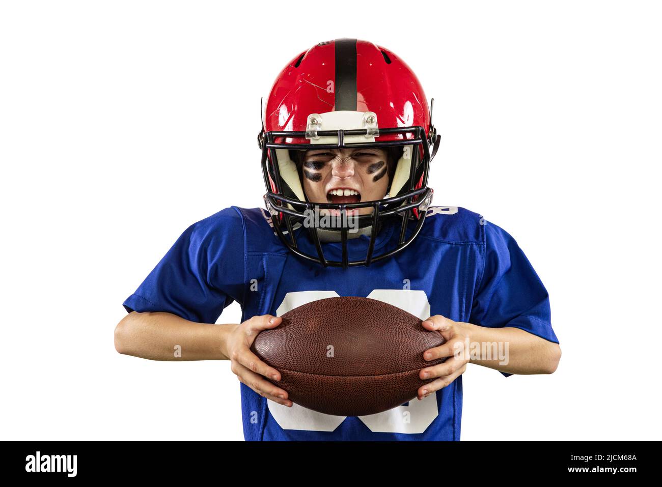 Closeup portrait of school age boy, beginner american football player ...
