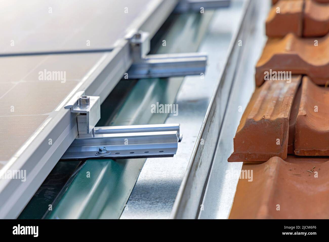 Solar Panel Holder Mounting Brackets at House Roof Stock Photo - Alamy