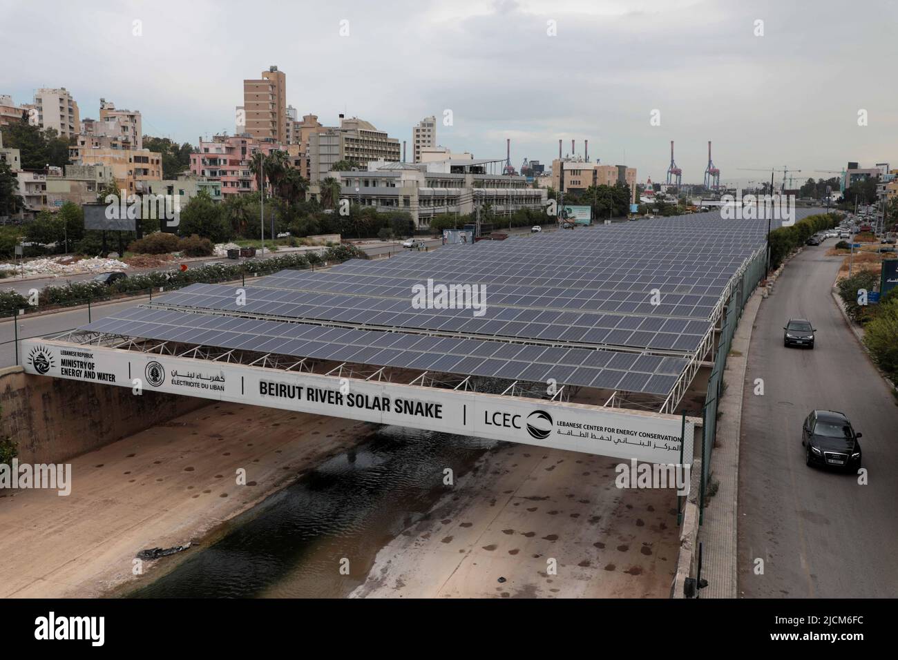 Beirut. 14th June, 2022. Solar panels are seen over the Beirut River in ...