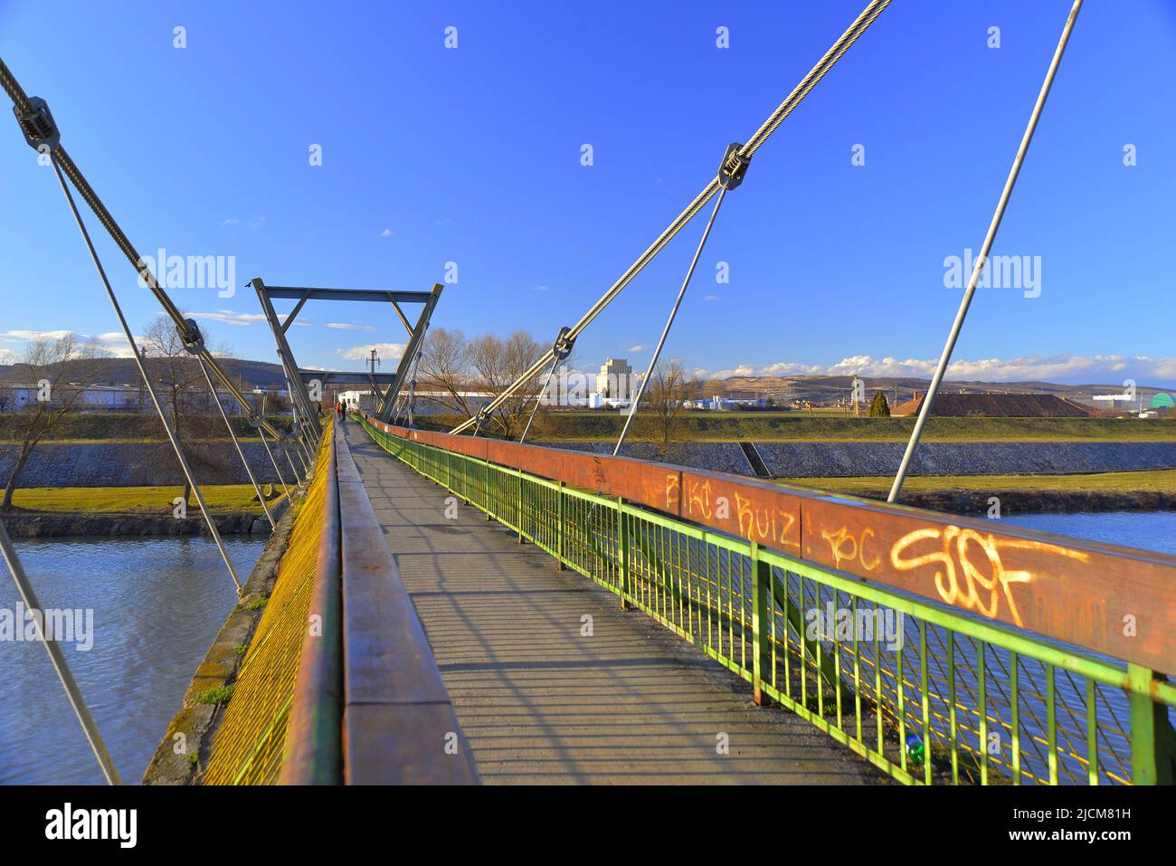 Old pedestrian suspension bridge Stock Photo - Alamy