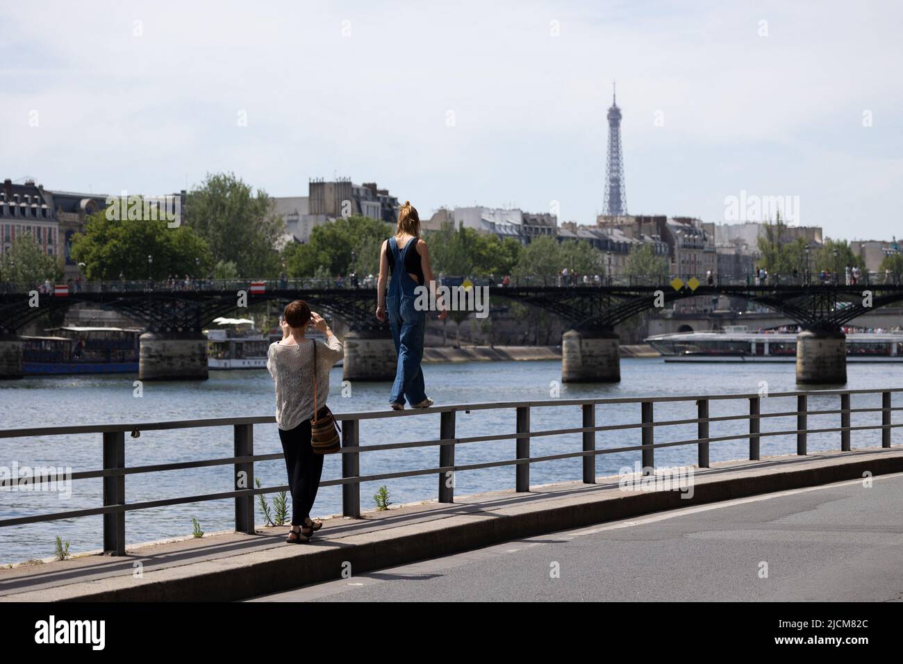 Paris, France, June 14, 2022. People near the Seine River with the ...