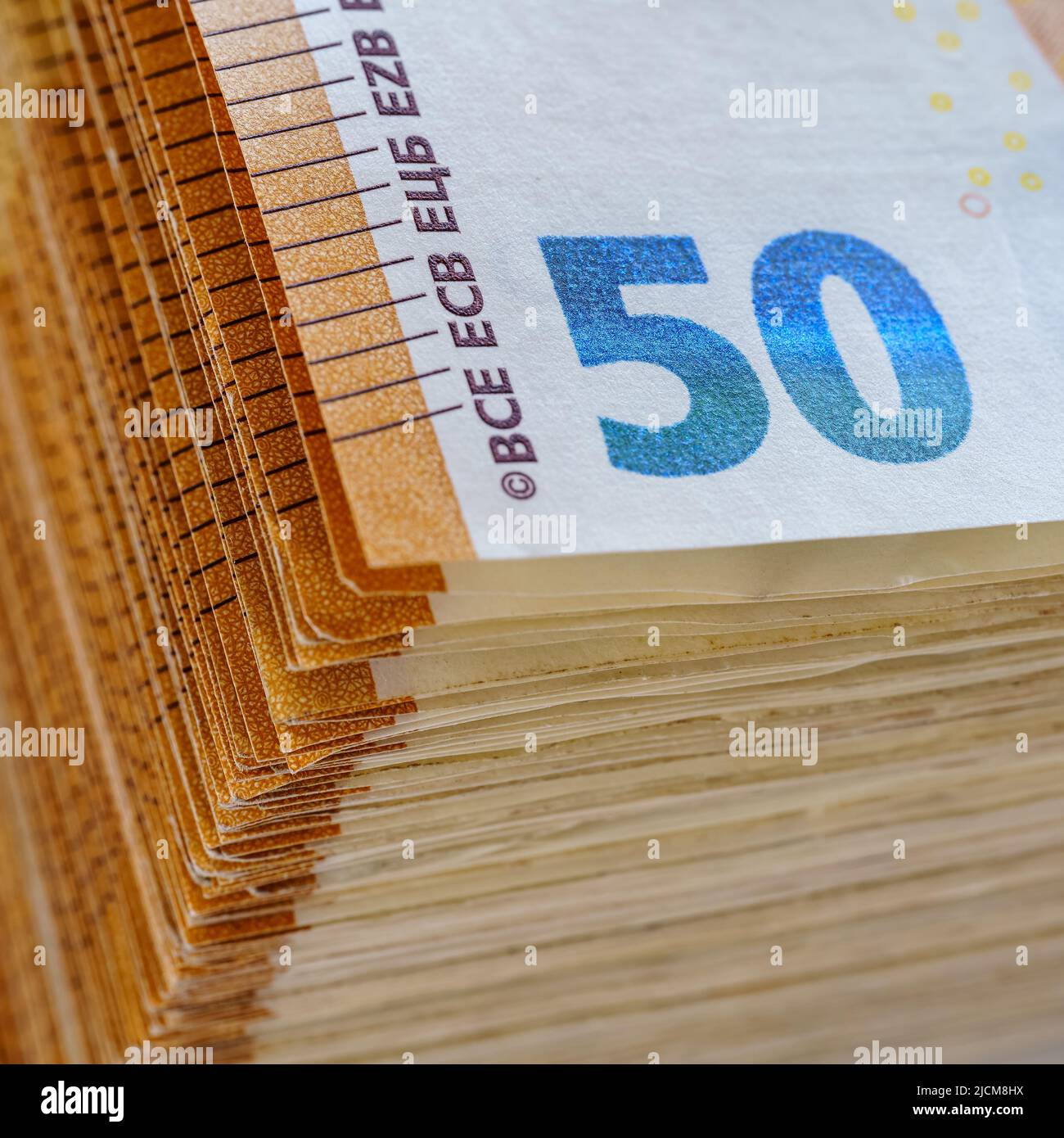 Large stack of 50 euro banknotes, European Union currency, on white ...