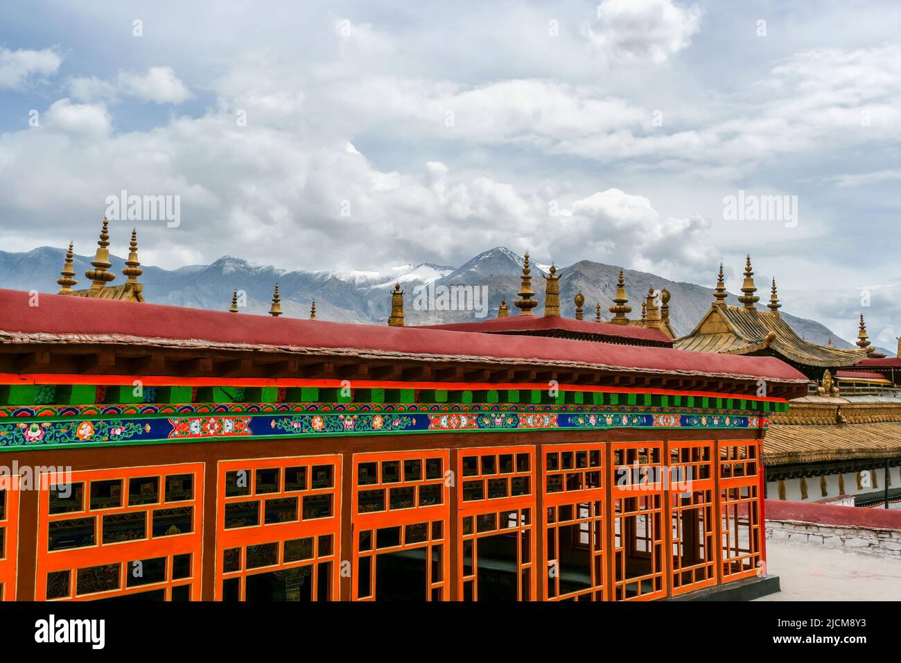 View of the Tibetan snow-capped mountains from the rooftop of Jokhang ...