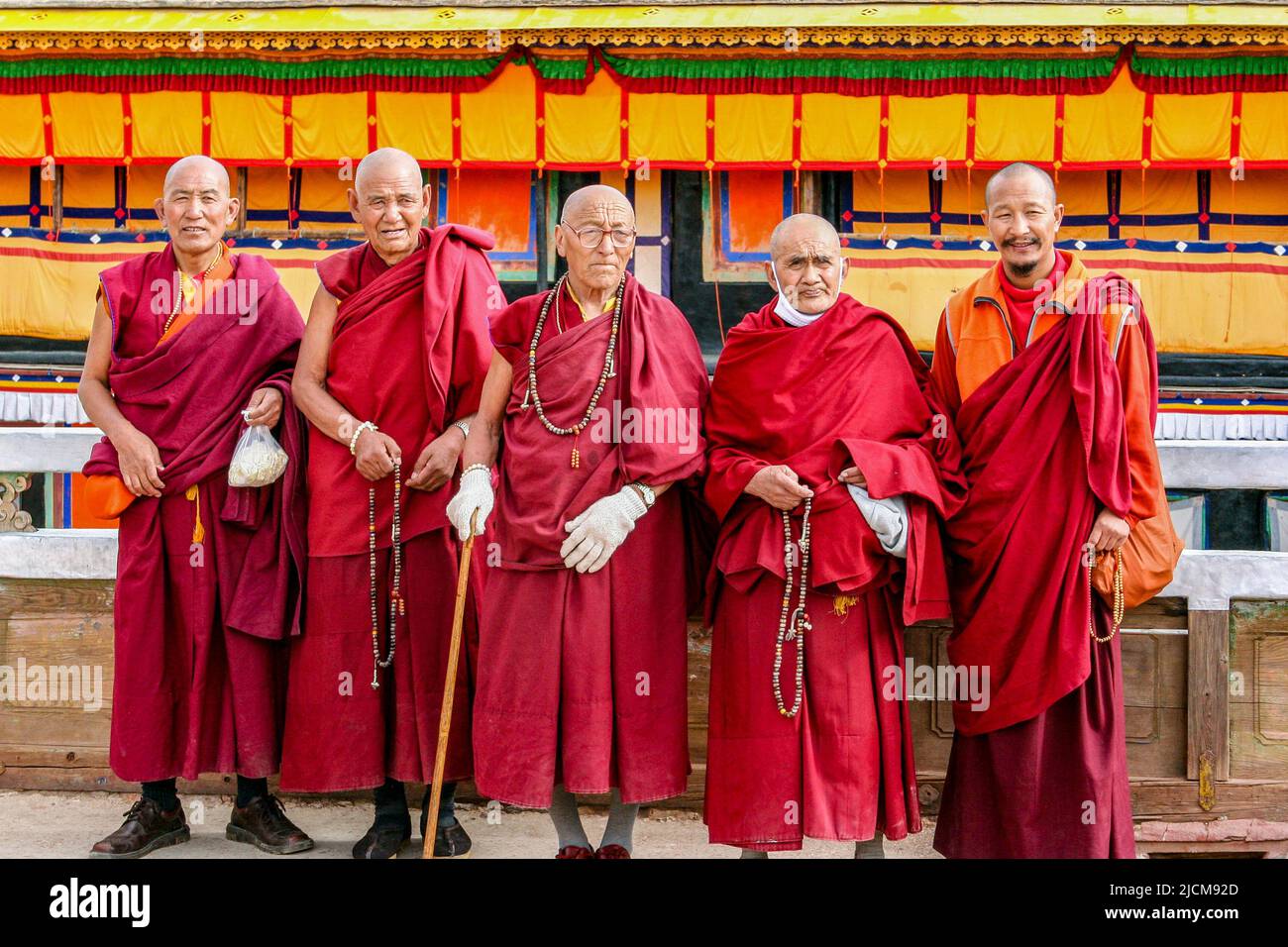 Five monks at Potala Palace posed for their photos to be taken Stock ...