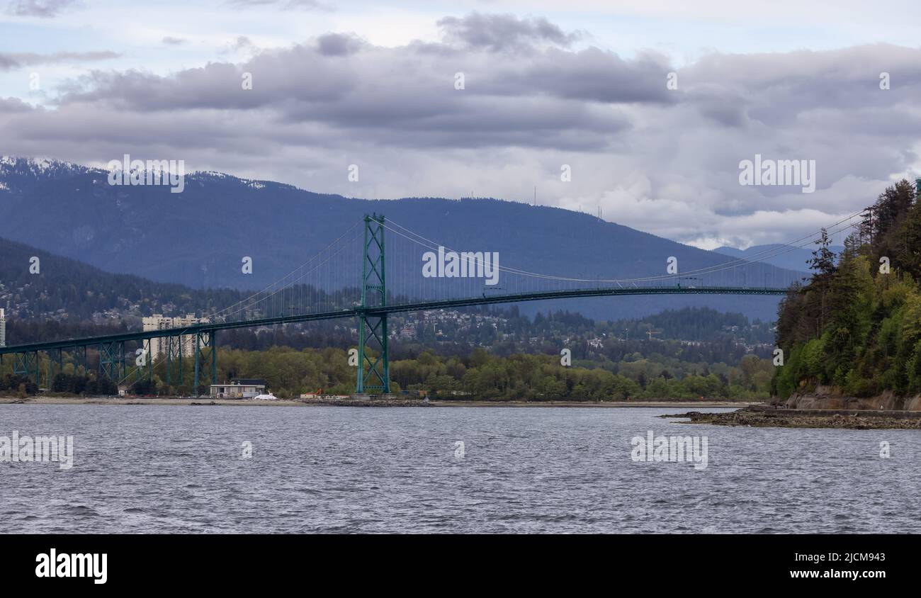 Lions Gate Bridge in a modern city on the West Coast of Pacific Ocean ...