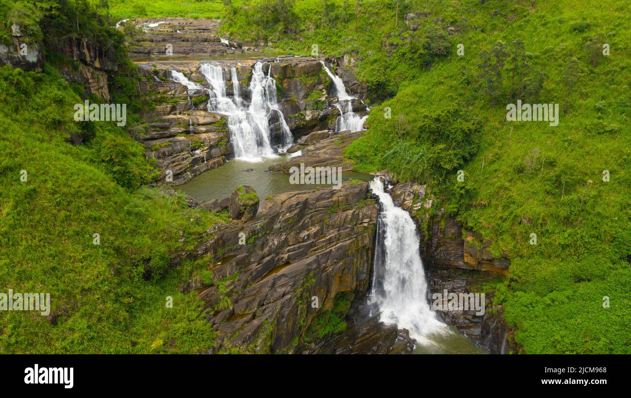 Beautiful waterfall in the mountains and tea estate. St. Clair Falls ...