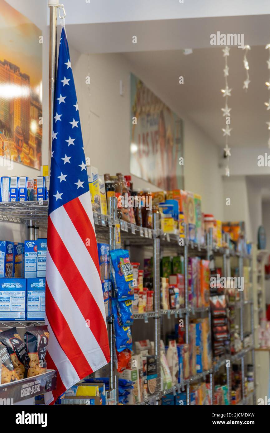usa flag inside a supermarket of american products for the celebration ...
