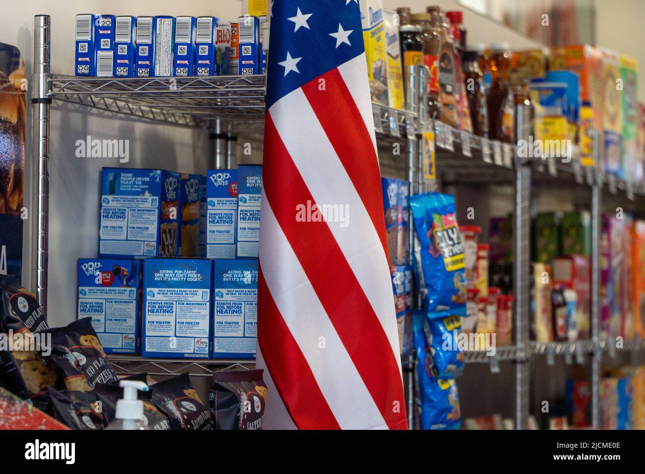 usa flag inside a supermarket of american products for the celebration ...