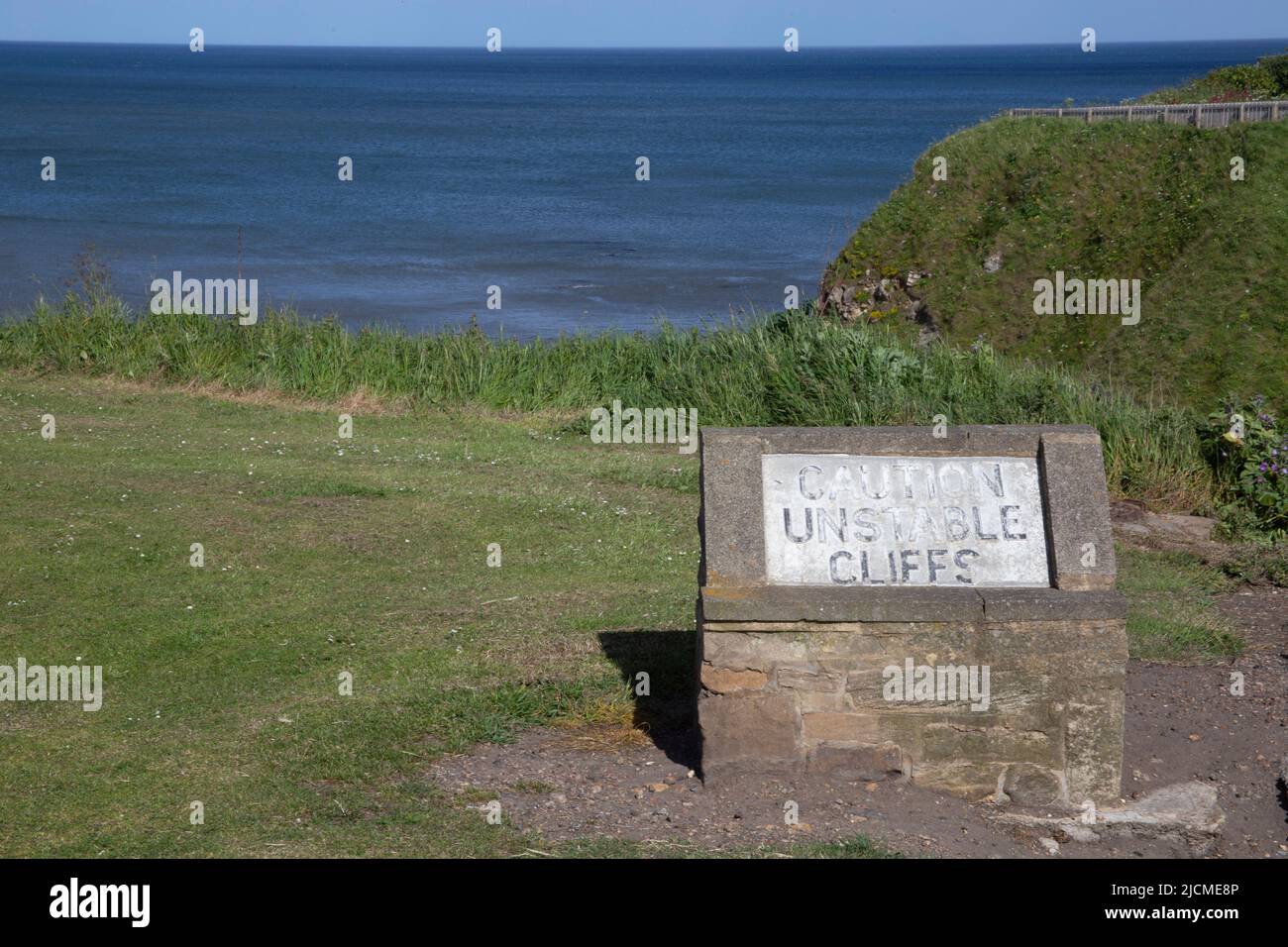 Caution Unstable Cliffs warning sign about coastal erosion Seaham ...