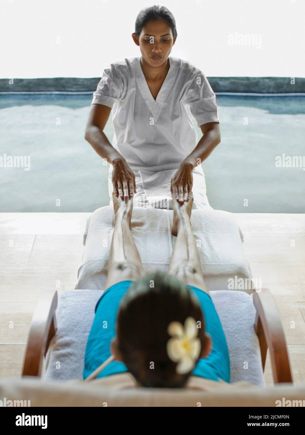 A Woman Receives A Thai Reflexology Treatment At A Spa In Sri Lanka