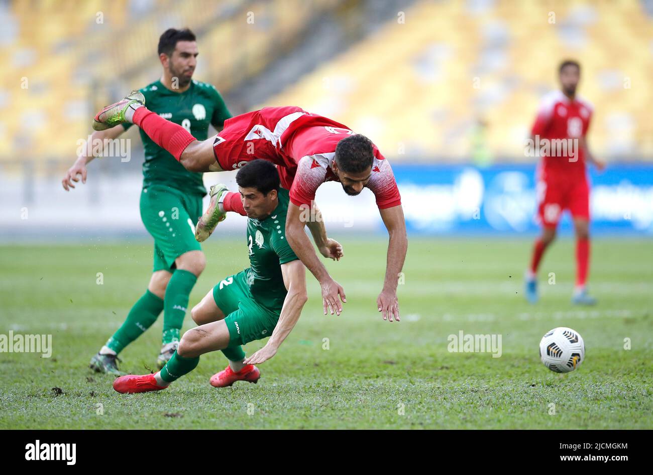 Abdulla Yusuf Helal (C) of Bahrain and Babajanov Zafar of Turkmenistan ...