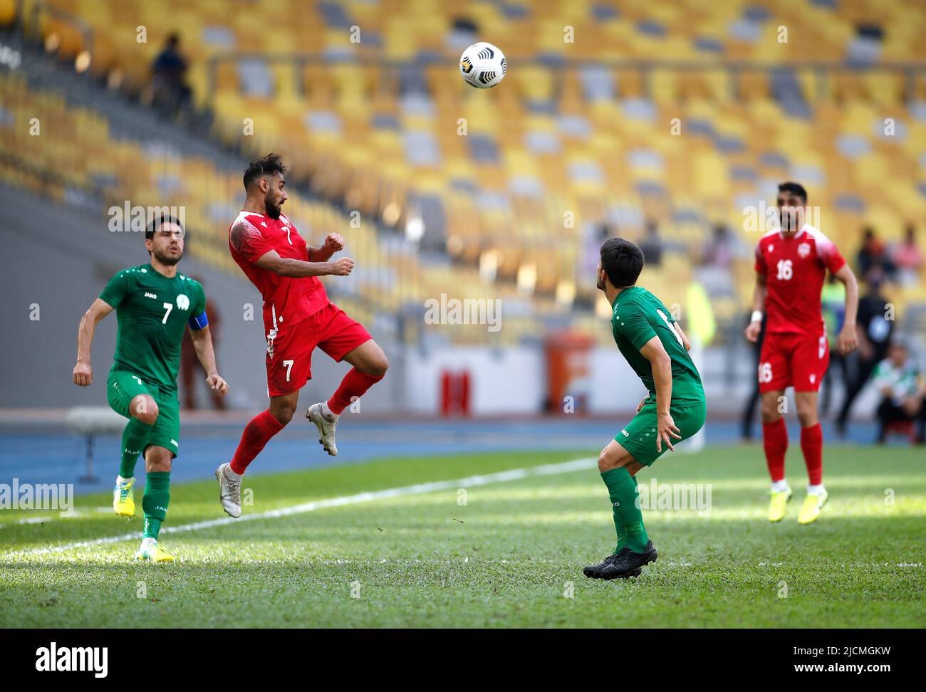 Ali Jaafar Madan (R) of Bahrain and Amanov Arslan of Turkmenistan in ...