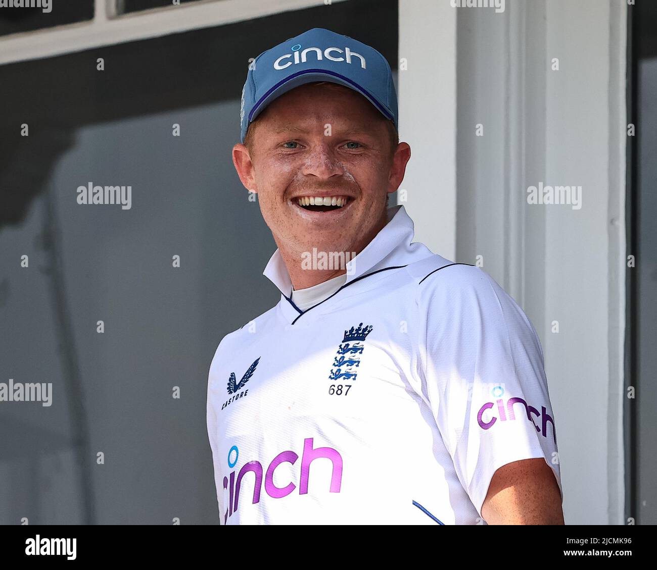 Ollie Pope of England full of smiles as Ben Stokes of England speaks ...