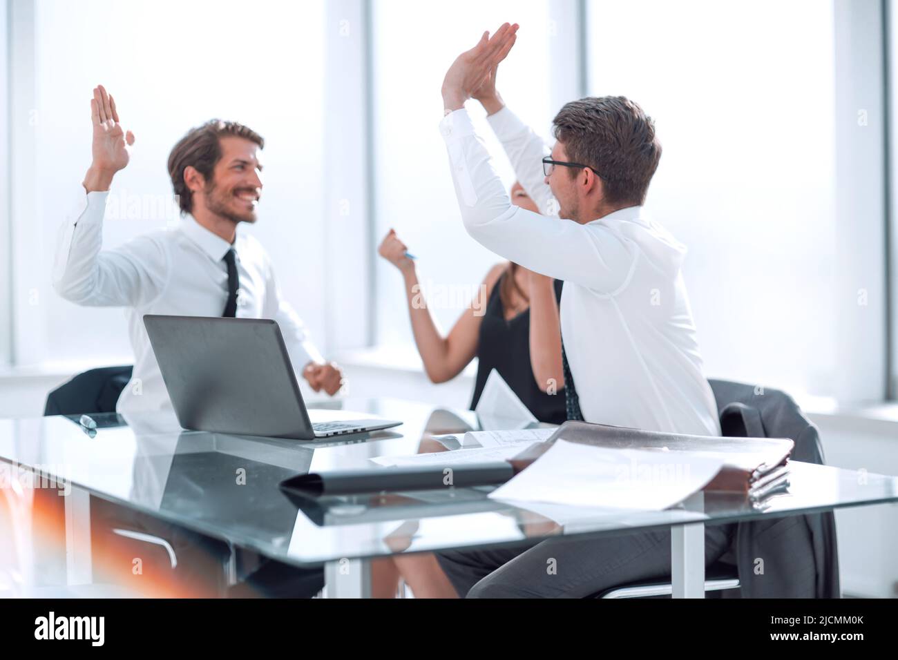 happy employees showing the success of teamwork Stock Photo - Alamy