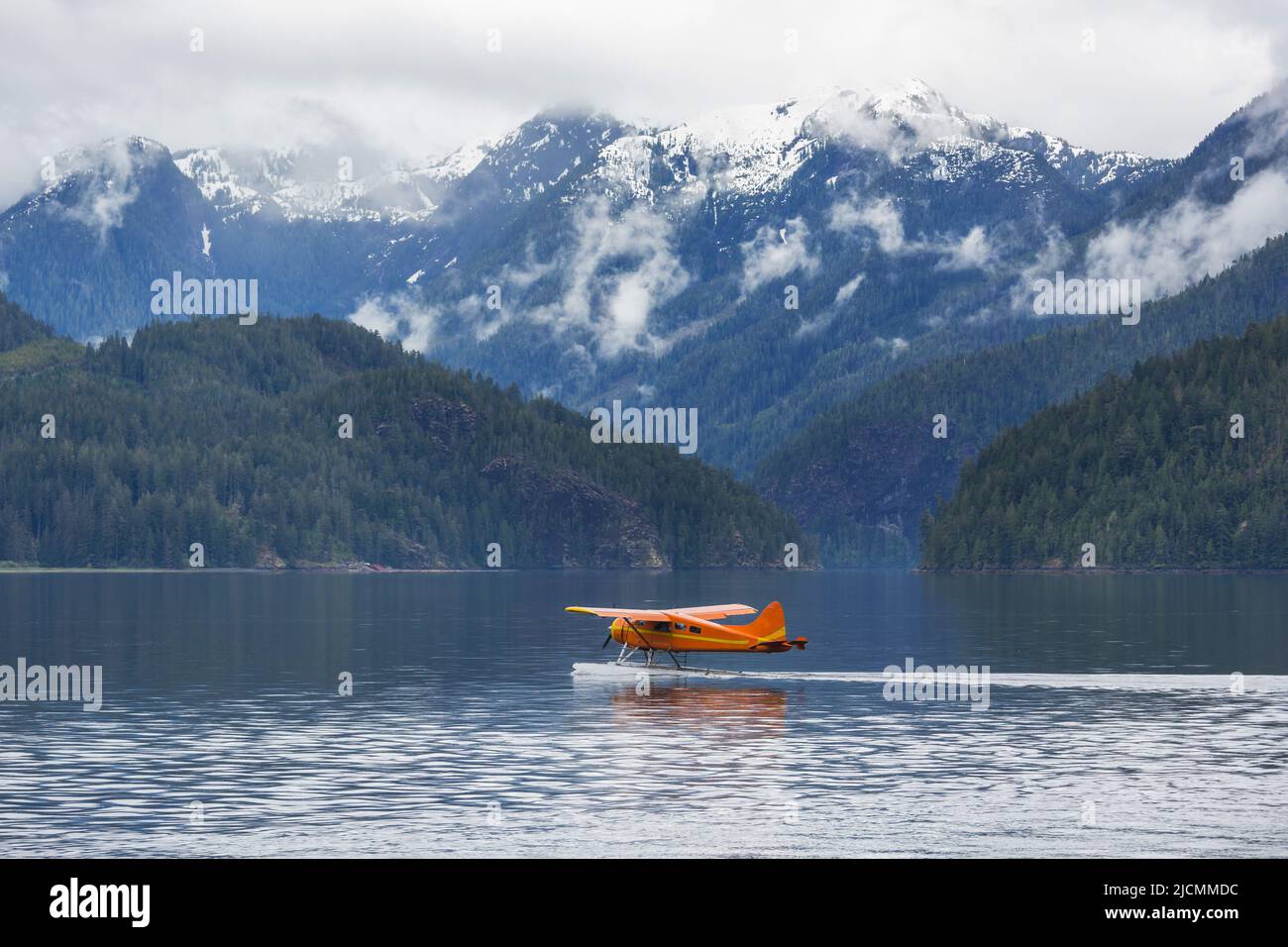 Float Plane in the mountains lake, Canada Stock Photo - Alamy