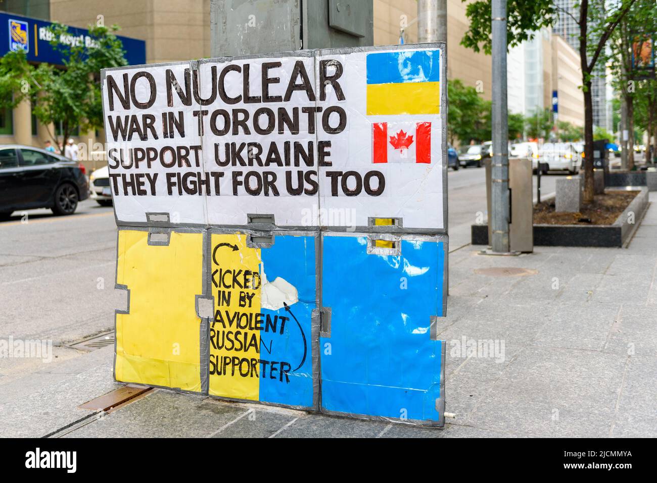 Signs supporting Ukraine and against the invasion of Russia. They are ...