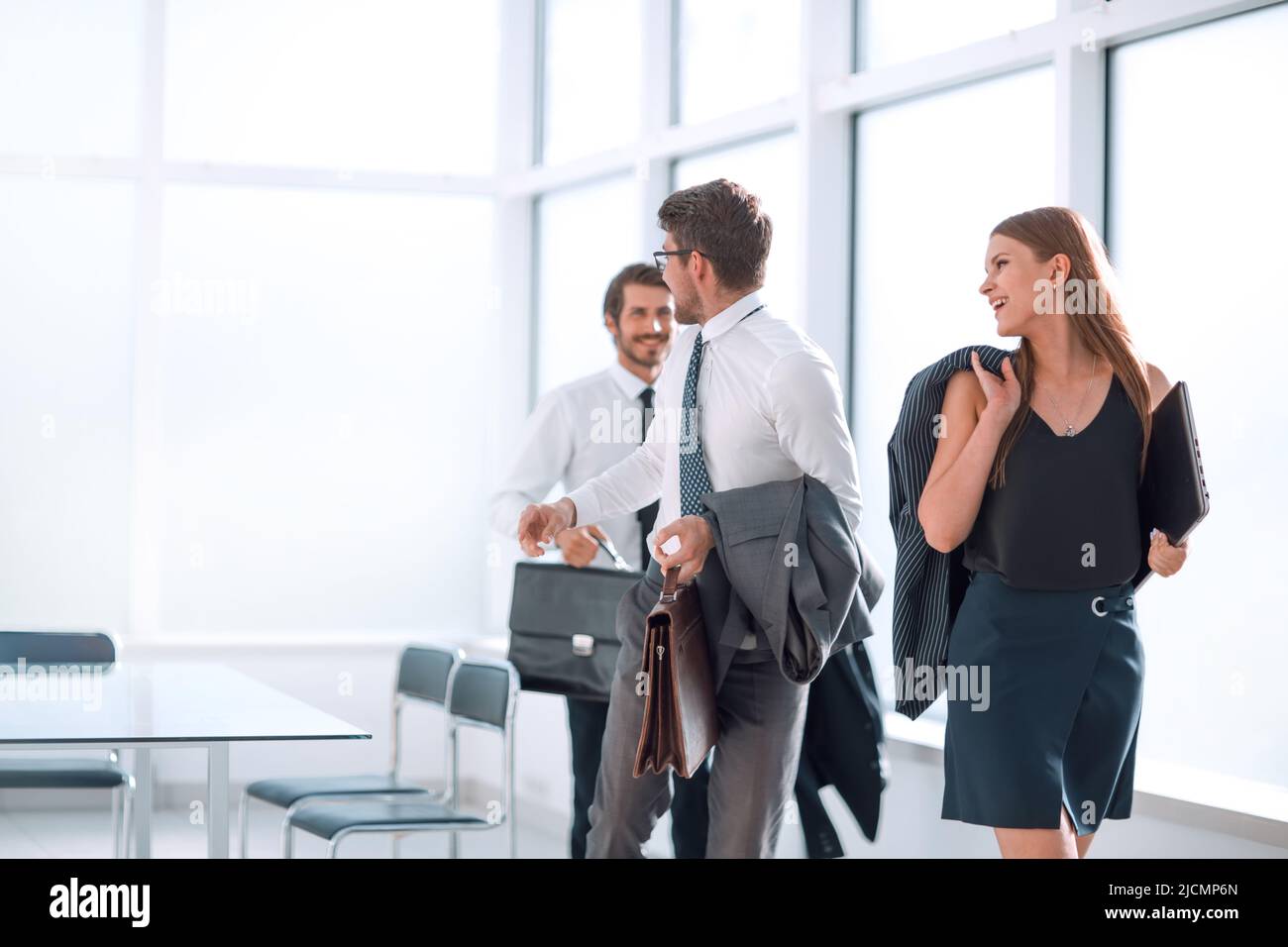 young employees leaving the office at the end of the working day Stock ...