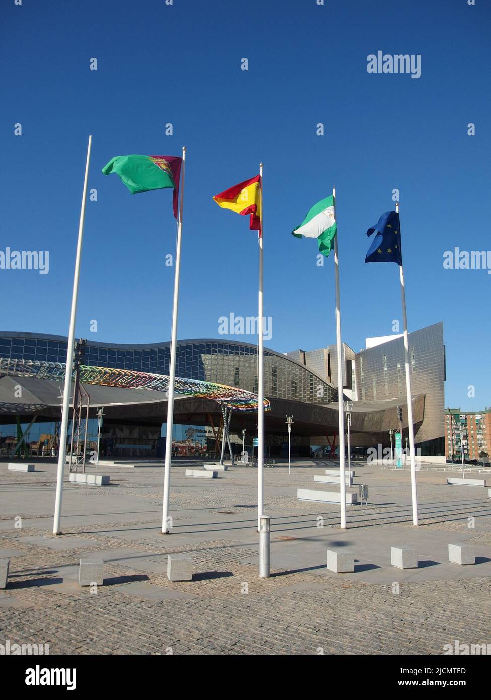 Flags at Malaga Trade Fair and Congress Center (FYCMA). Spain Stock ...
