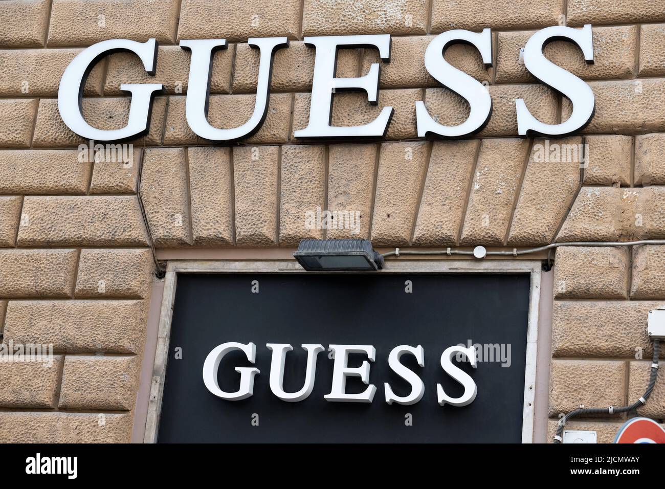 A shop sign of GUESS, on May 07, 2022 in Roma, Italy. Photo by David ...