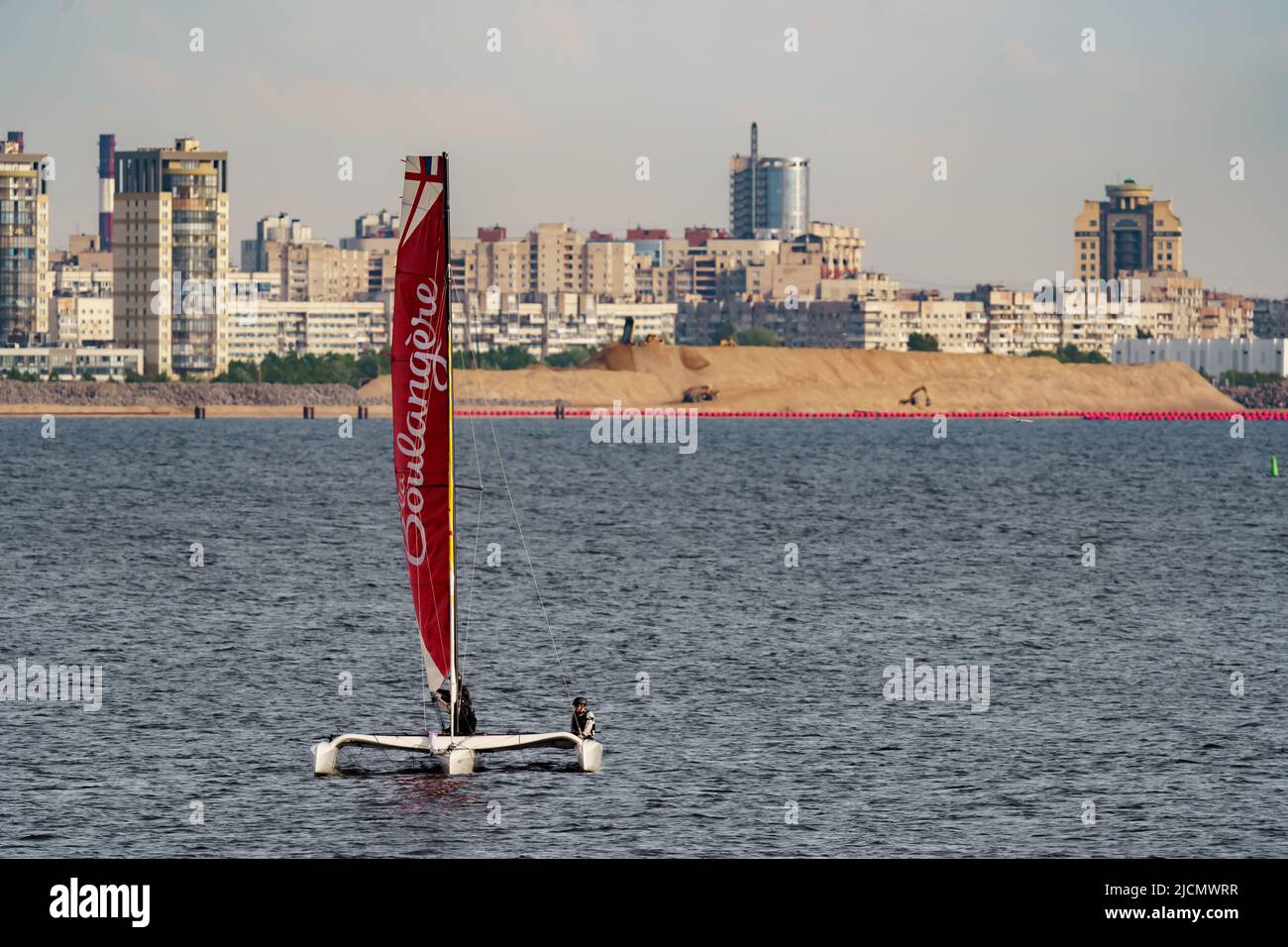 Russia, St. Petersburg, 10 June 2022: The trimaran with professional ...
