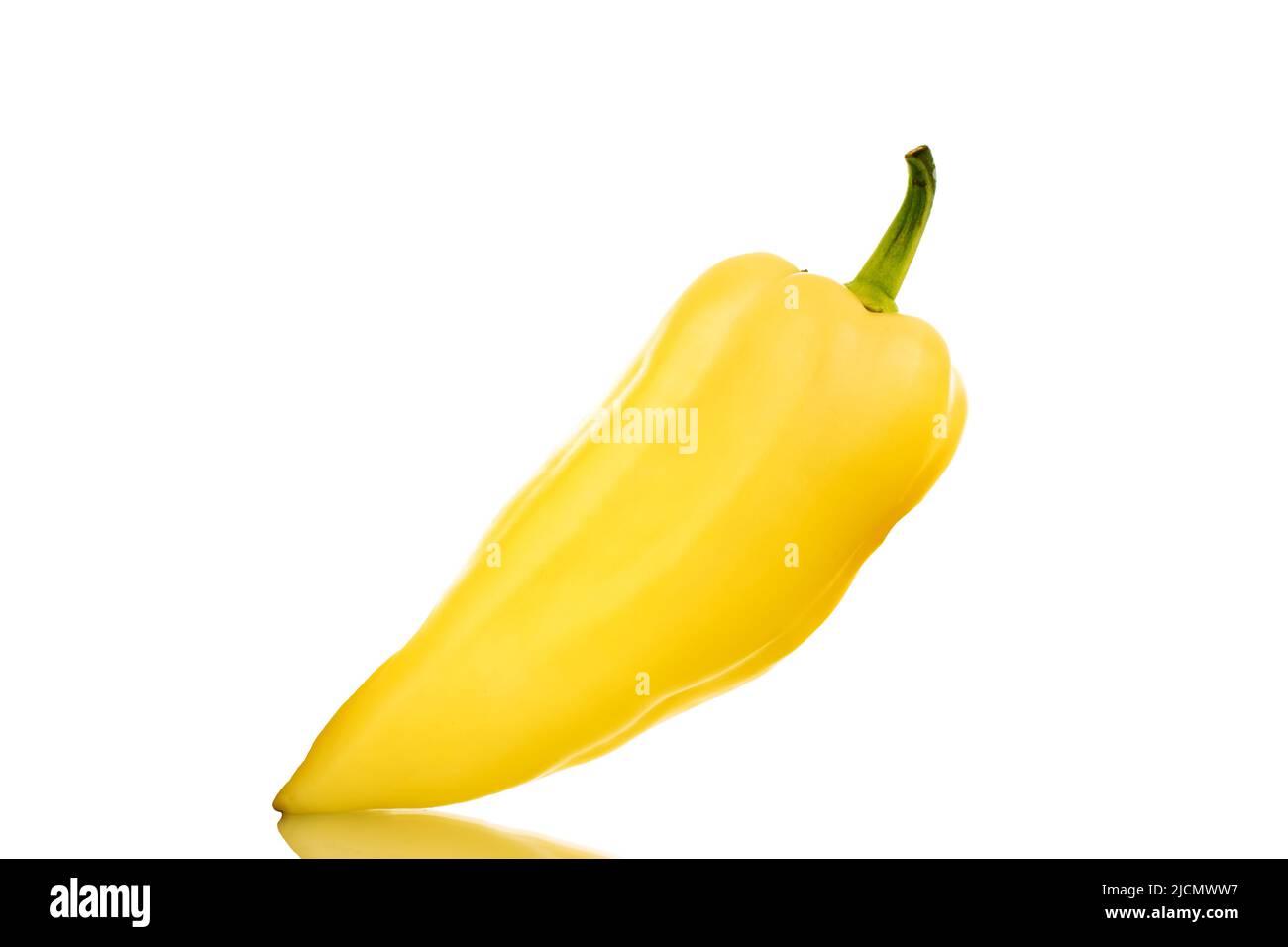 One bright yellow sweet pepper, close-up, isolated on a white ...
