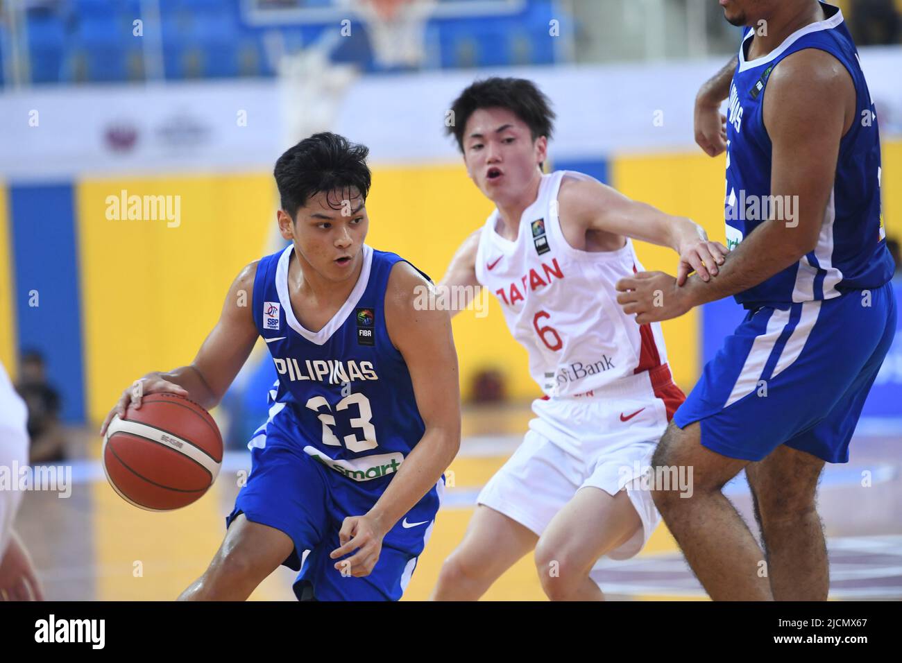 Doha, Qatar. 14th June, 2022. Suguru Ishiguchi (M) of the Japan Basketball team and Lebron ...